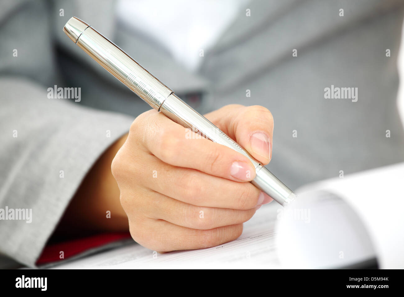 woman write by pen on paper Stock Photo - Alamy