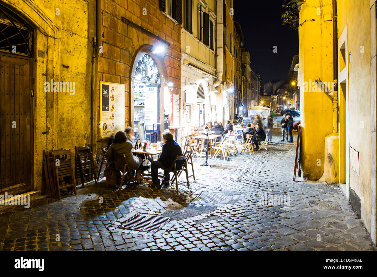 Street with bars and restaurants in Roman Ghetto (Ghetto di Roma). Rome ...