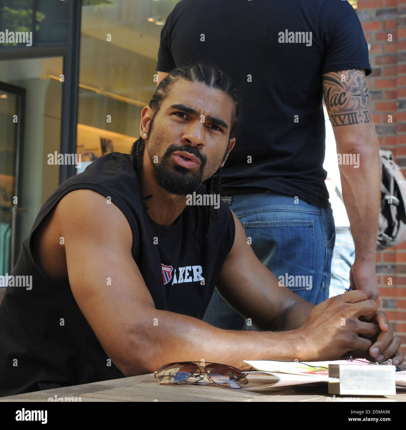 David Haye recording a TV interview outside Hyatt hotel. Hamburg ...