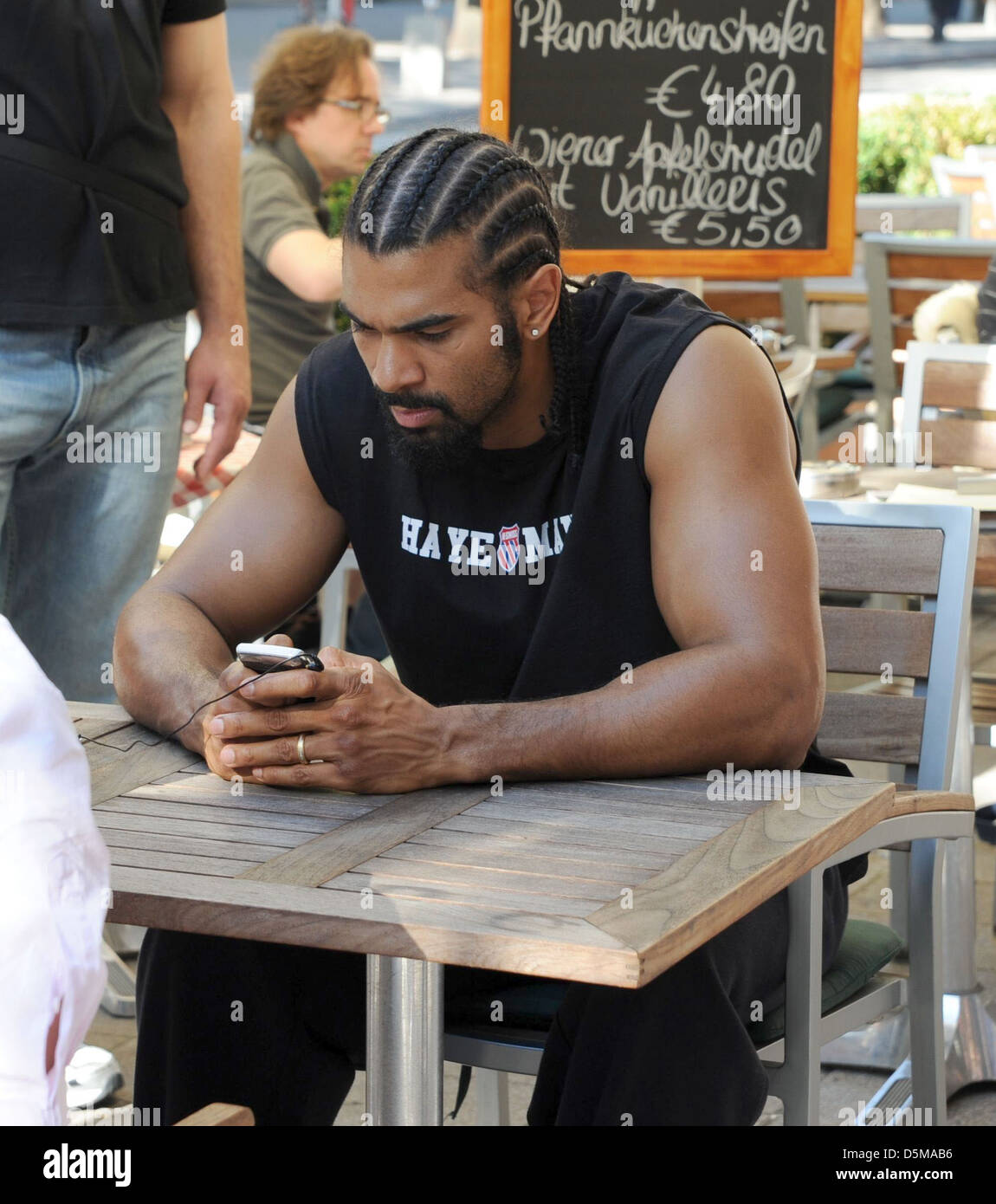 David Haye recording a TV interview outside Hyatt hotel. Hamburg ...