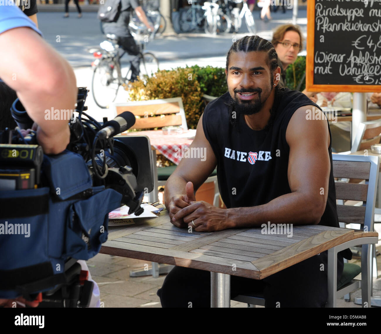 David Haye recording a TV interview outside Hyatt hotel. Hamburg ...