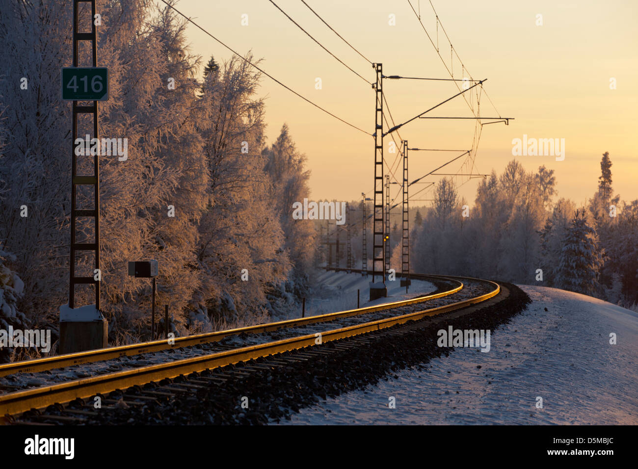 Railroad rails at evening light , Finland Stock Photo - Alamy