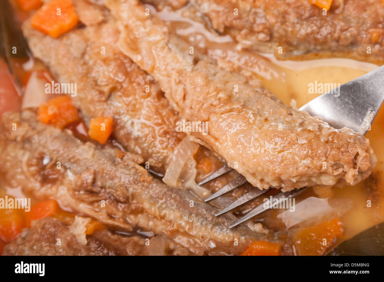 juicy snack a roast pickled smelt with carrots Stock Photo - Alamy