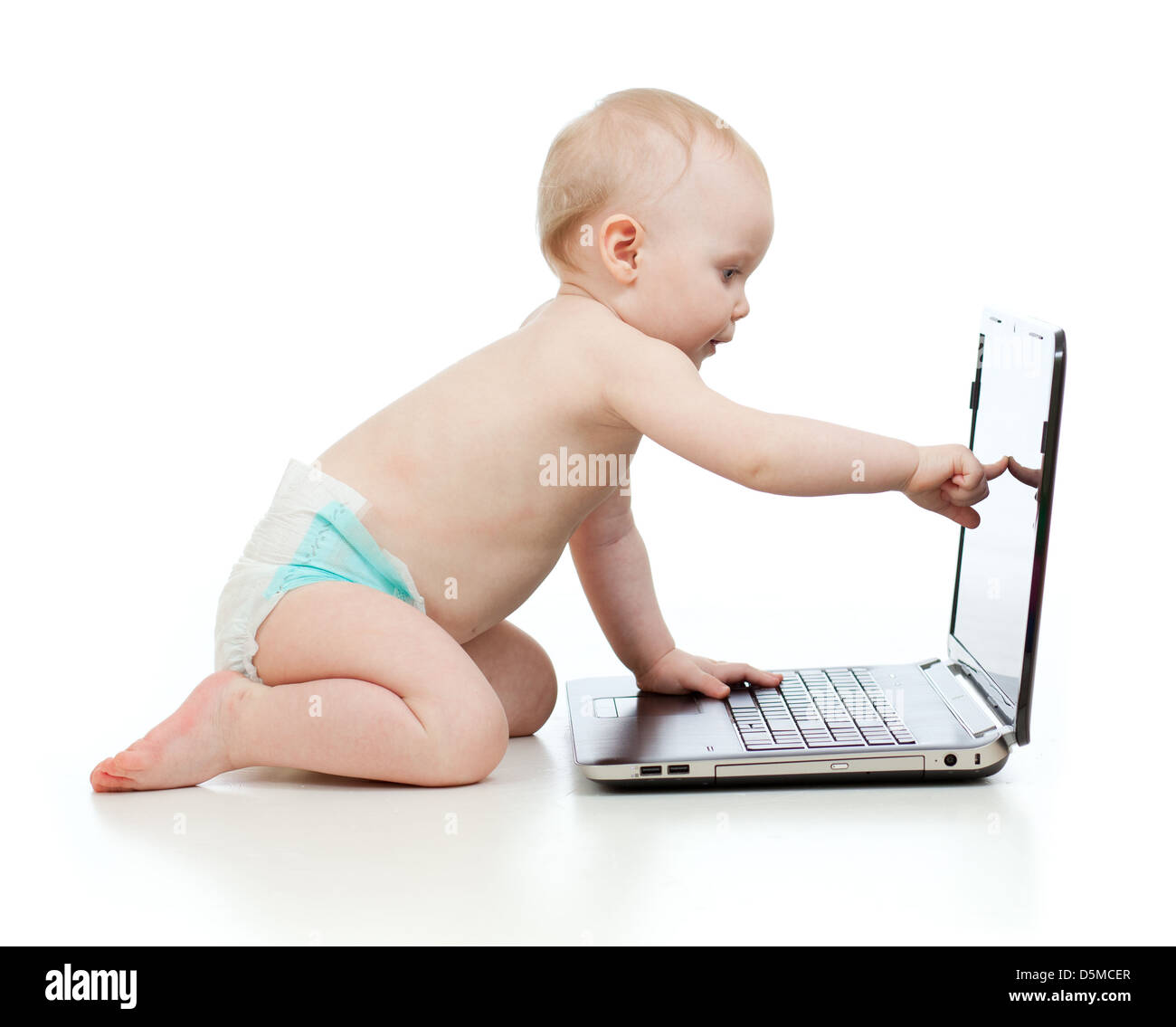 Child using a laptop Stock Photo - Alamy
