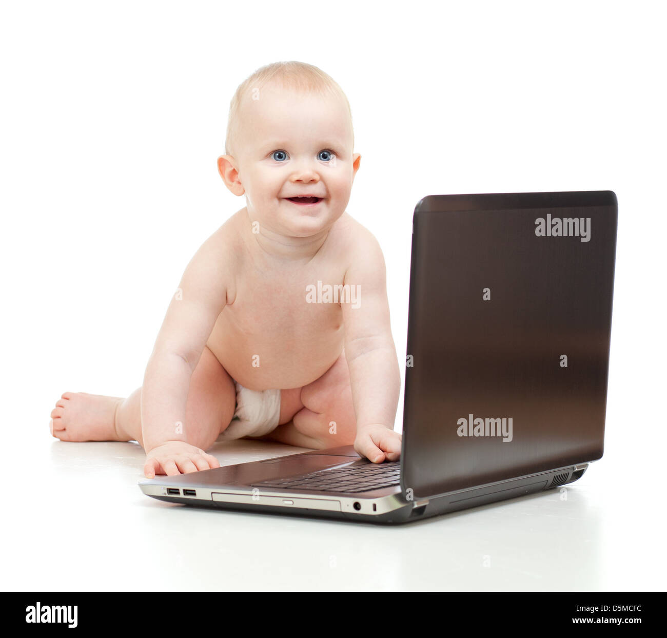 Child using a laptop Stock Photo - Alamy