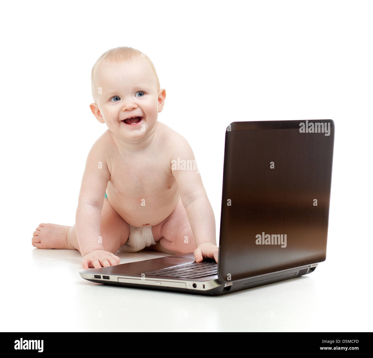 Child using a laptop Stock Photo - Alamy