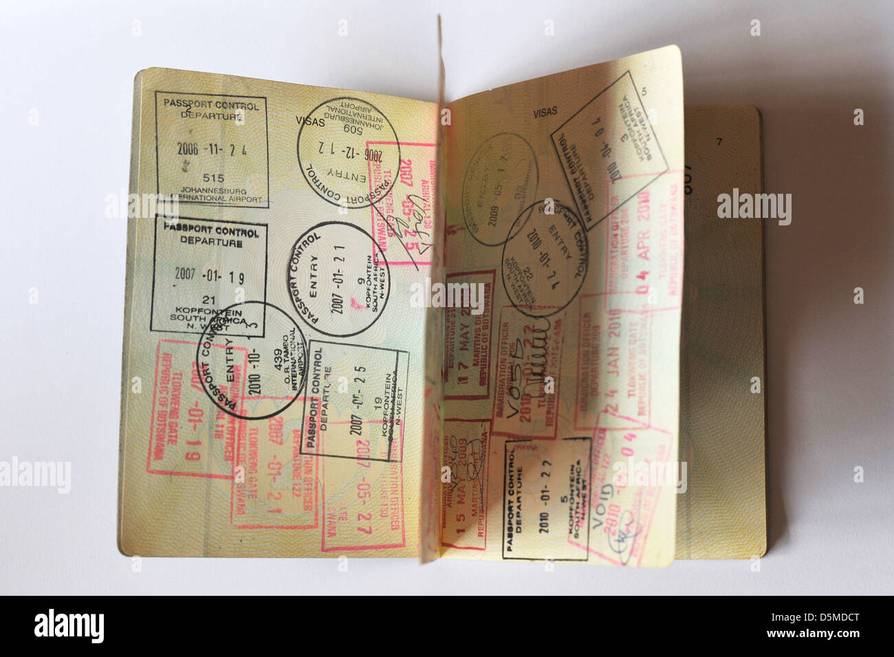 Fully stamped Visa pages in a Passport Stock Photo - Alamy