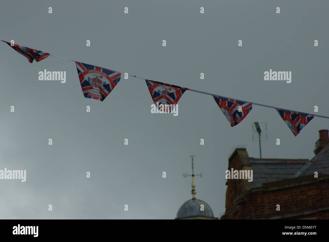 union jack beer towers bricks dark sky Stock Photo - Alamy