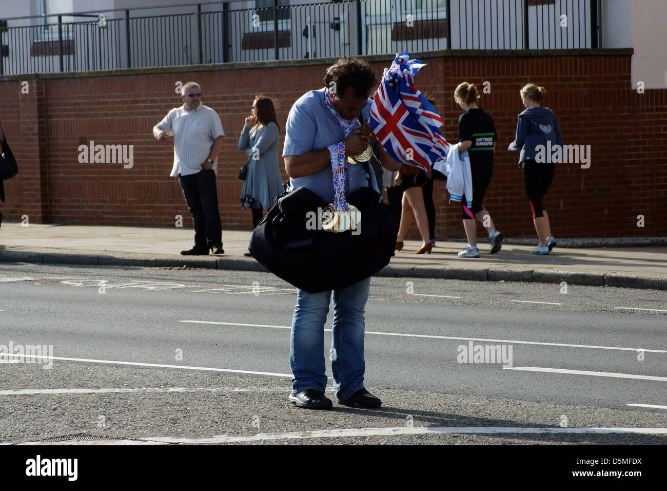 saleman smoking union jack flags gold medals people Stock Photo - Alamy