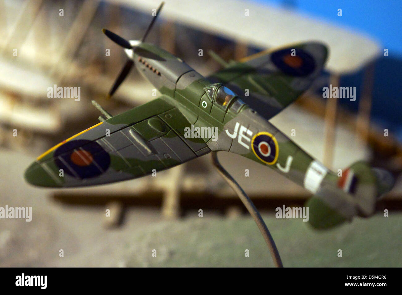 spitfire flying wall plane fighter ww2 model dust Stock Photo - Alamy