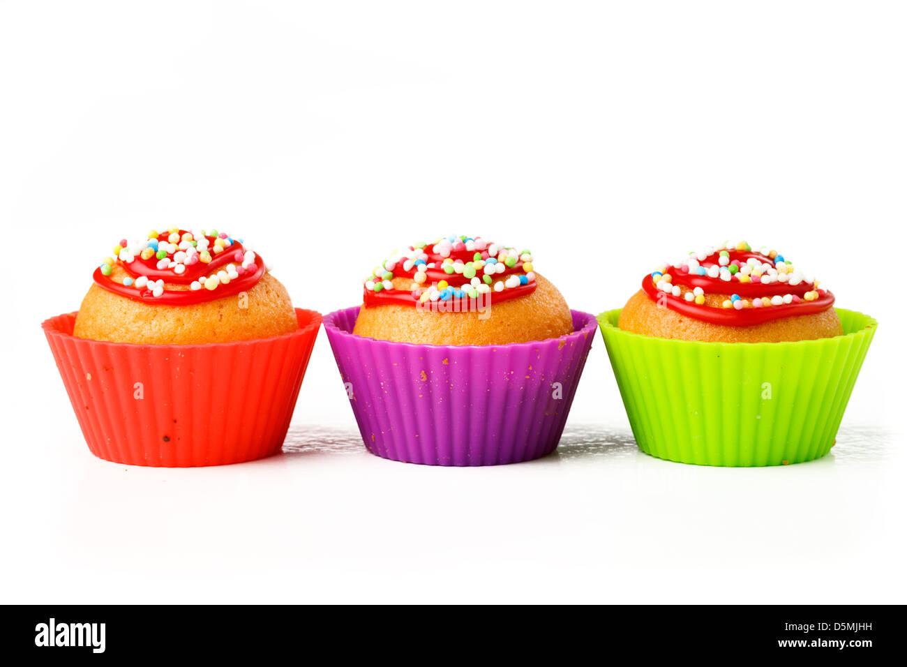 Three Muffins with decorations Stock Photo - Alamy