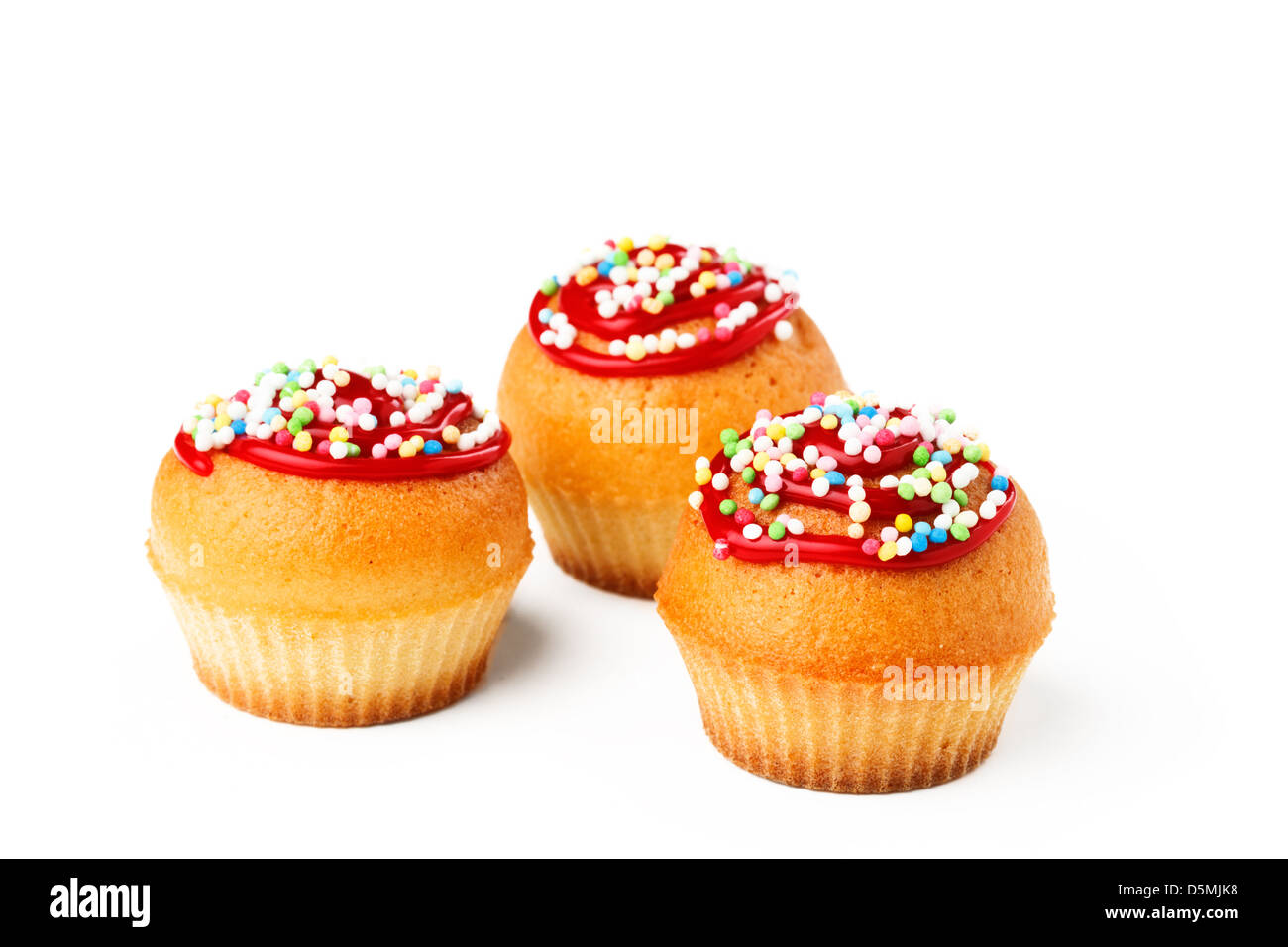 Three Muffins with decorations Stock Photo - Alamy