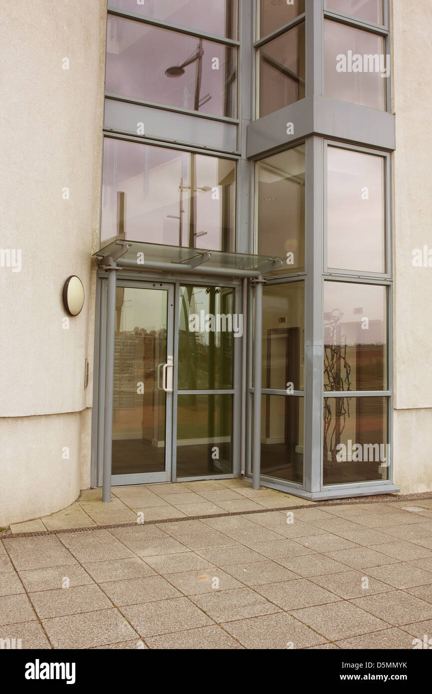 Boring grey entrance to a newly built block of apartments in Cardiff ...