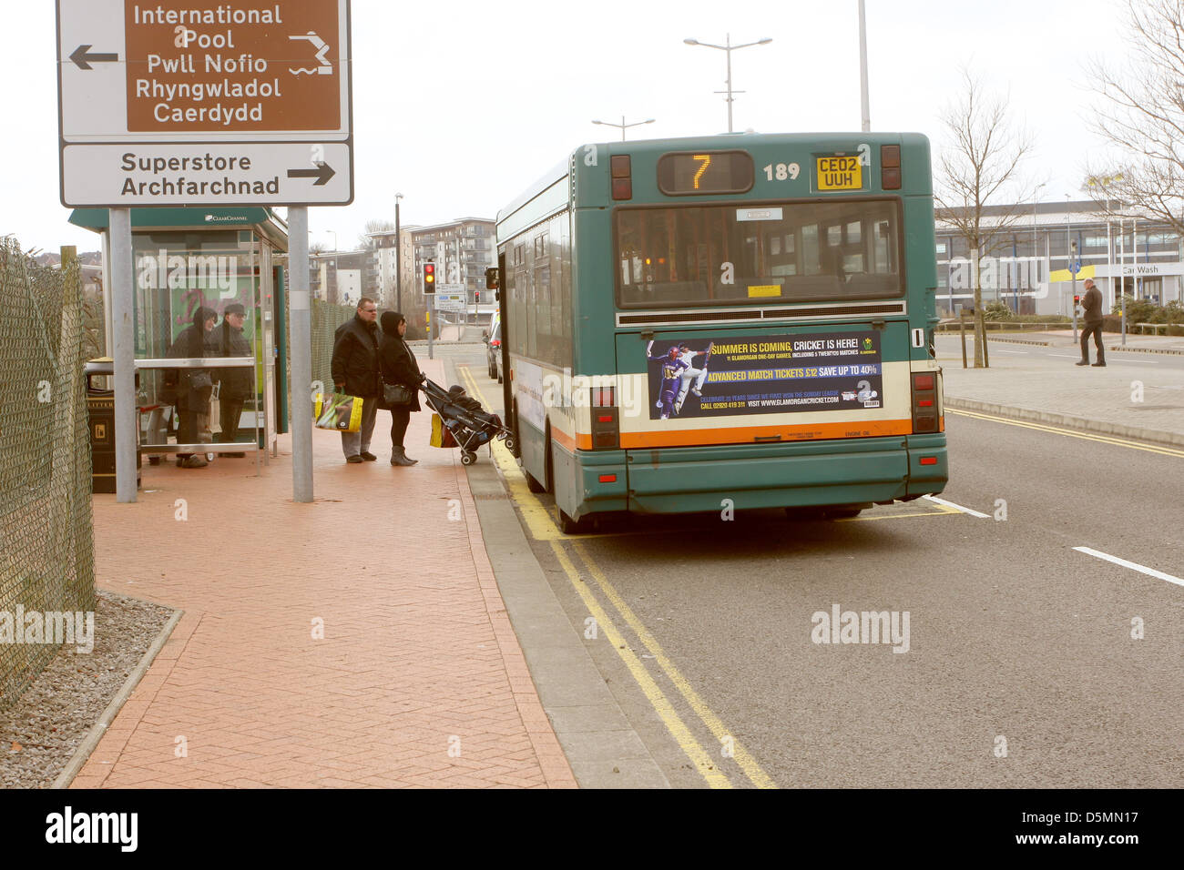 Passengers climbing on to a Cardiff city bus service, April 2013 Stock ...