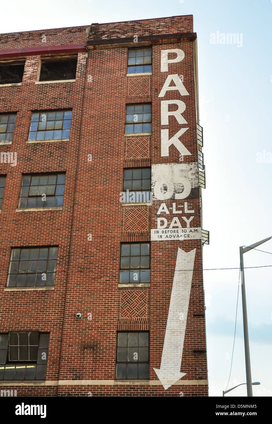 old brick building indicating parking Stock Photo - Alamy