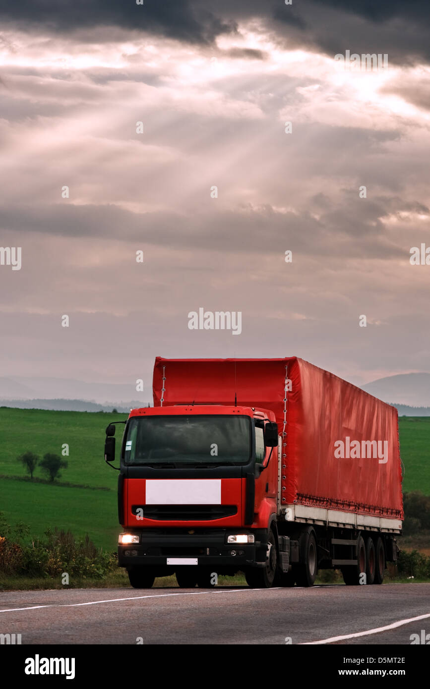 Red truck driving on hi-res stock photography and images - Alamy