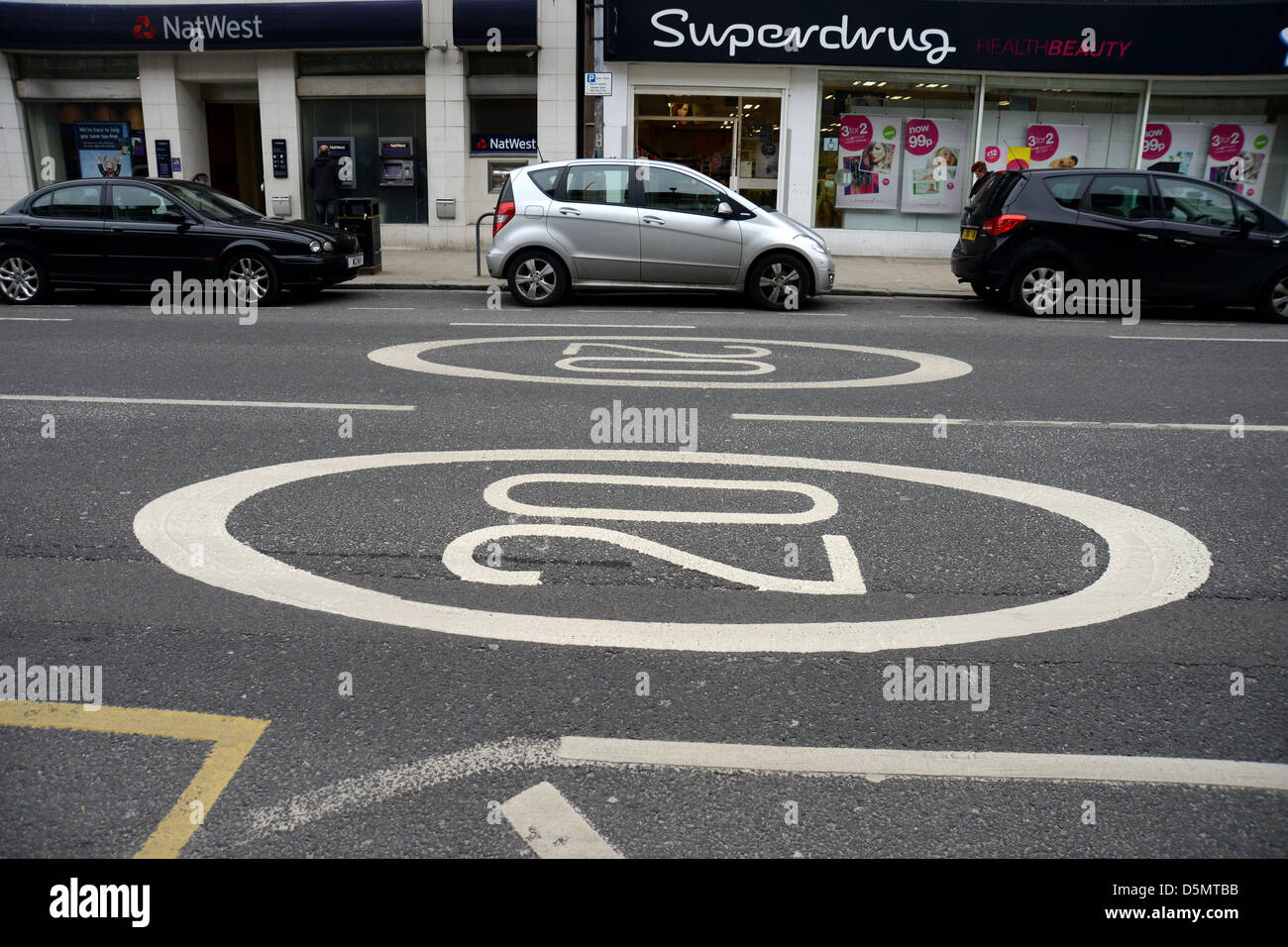 20mph speed limit signs painted onto the road on Lewes Road in Brighton ...