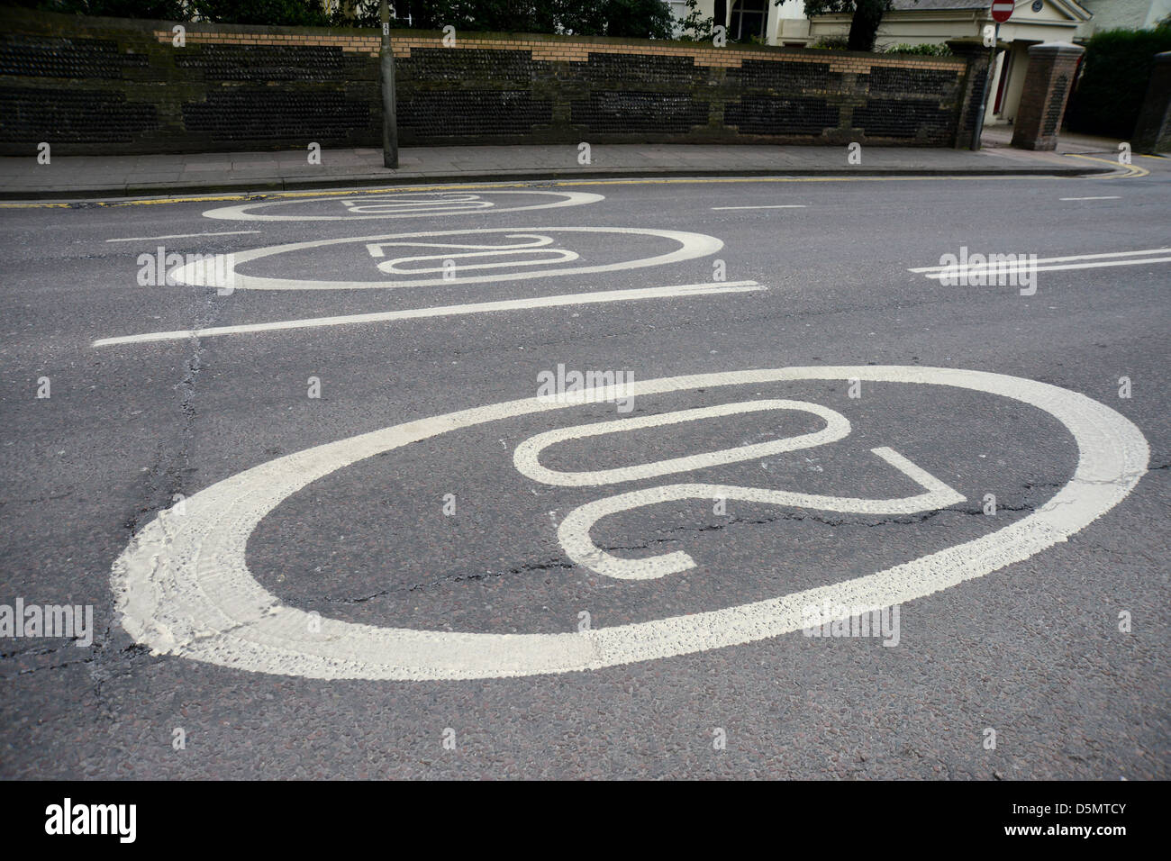 20mph speed limit signs painted onto the road on Lewes Road in Brighton ...