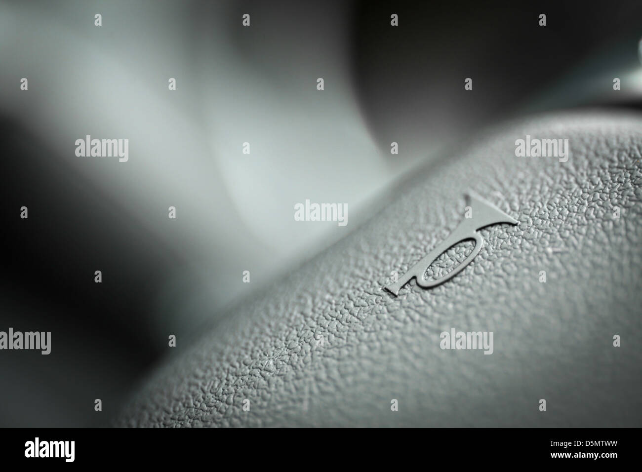 Close up shot of the horn button on a car's steering wheel Stock Photo ...