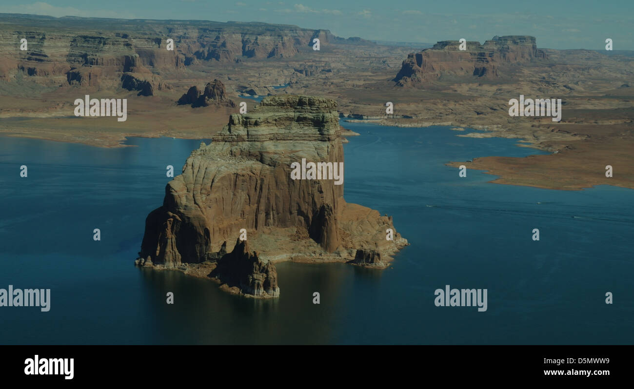 Aerial view Gregory Butte rising from blue waters Lake Powell, looking ...
