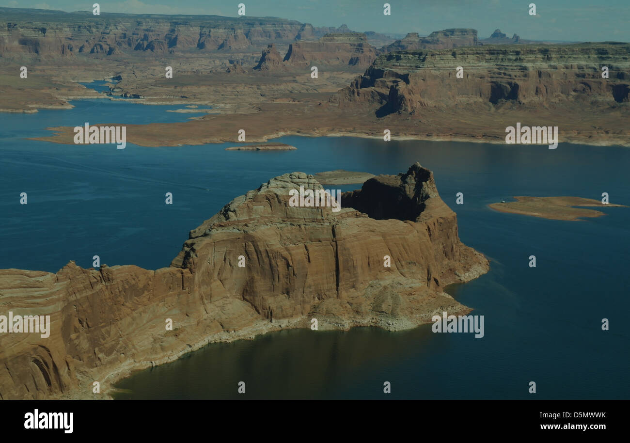 Aerial view stratified sandstone cliffs Gooseneck Point extending blue ...