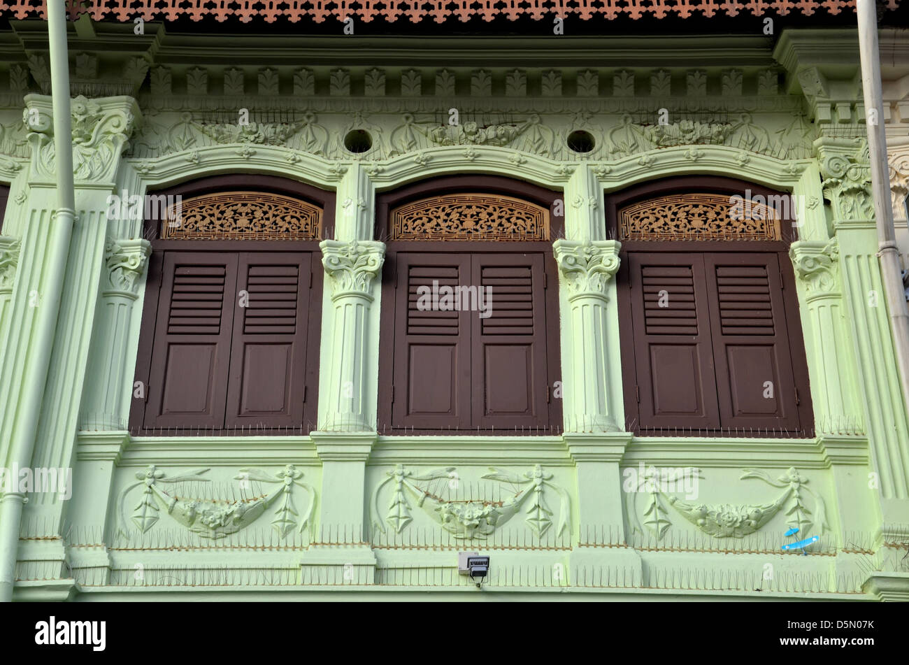 Ornate window shutters wall pattern Stock Photo - Alamy