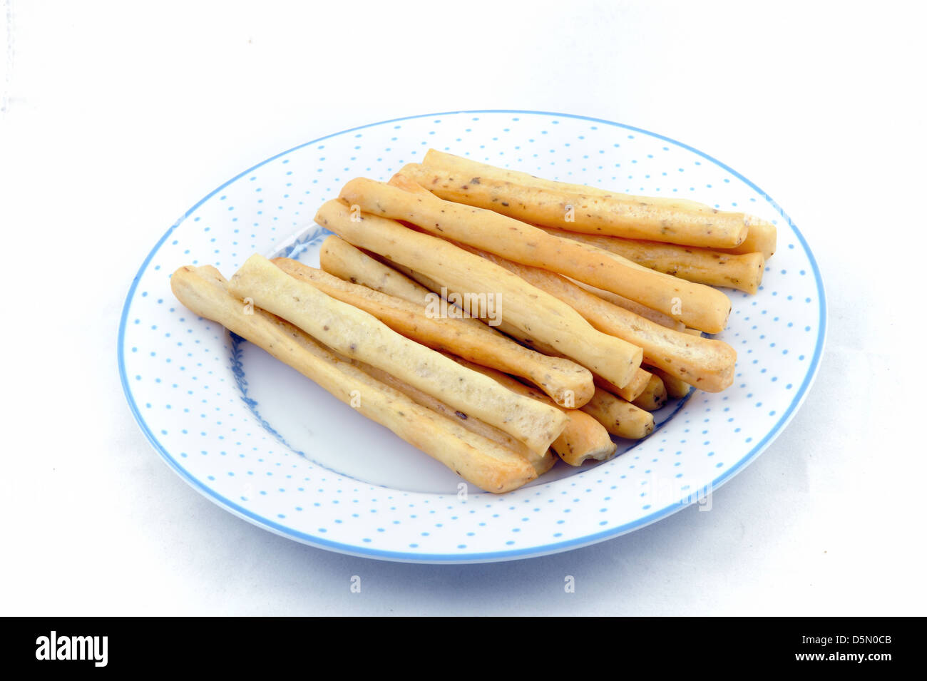 Bread sticks on white background Stock Photo - Alamy
