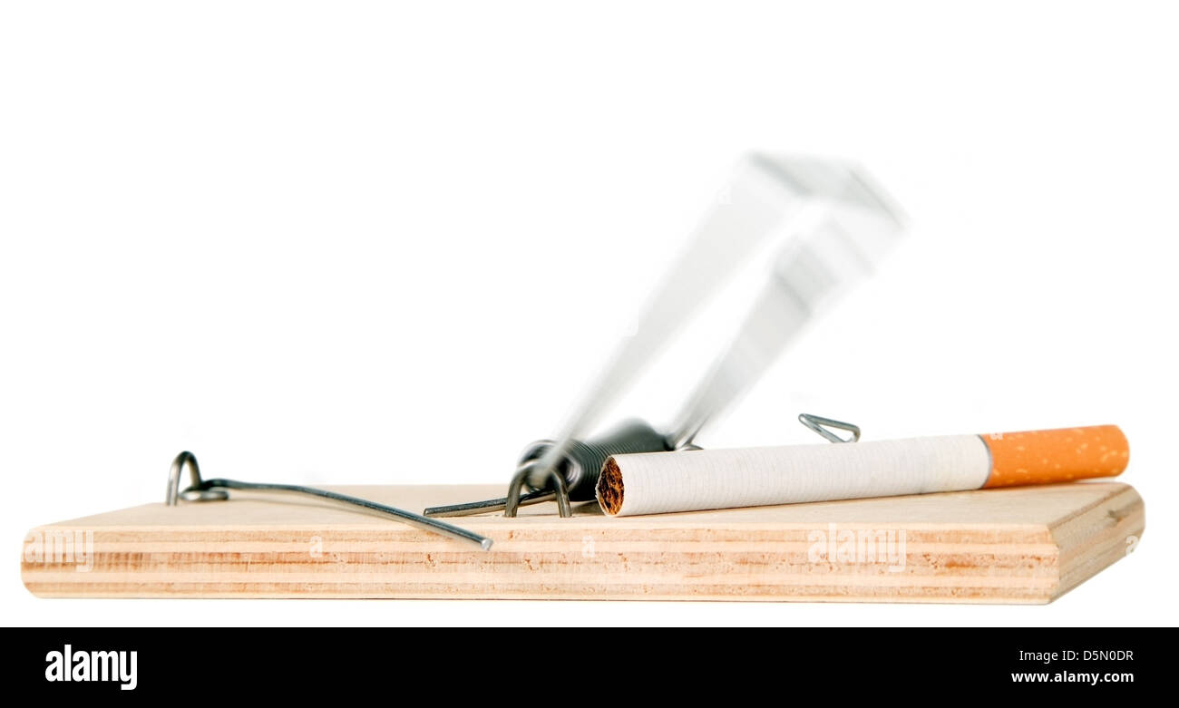 A mouse trap with cigarette on it Stock Photo - Alamy