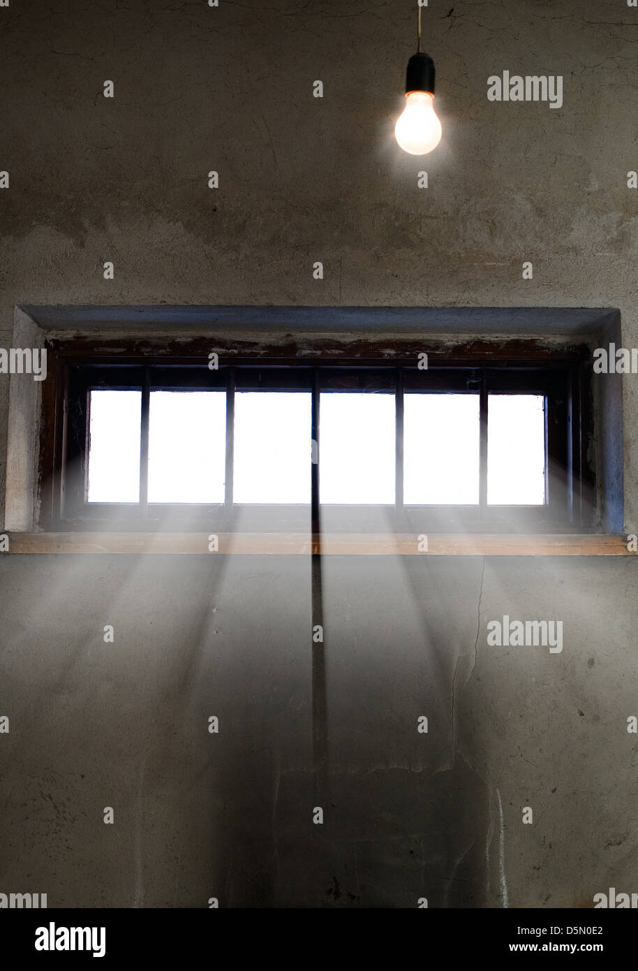 Light is coming through the barred window, hope concept Stock Photo - Alamy