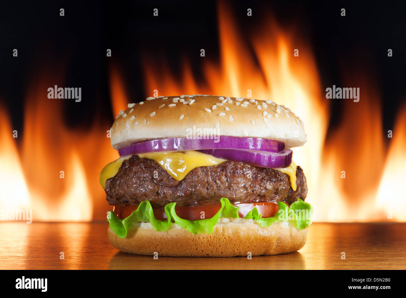 Hamburger fire flame cheeseburger hi-res stock photography and images ...
