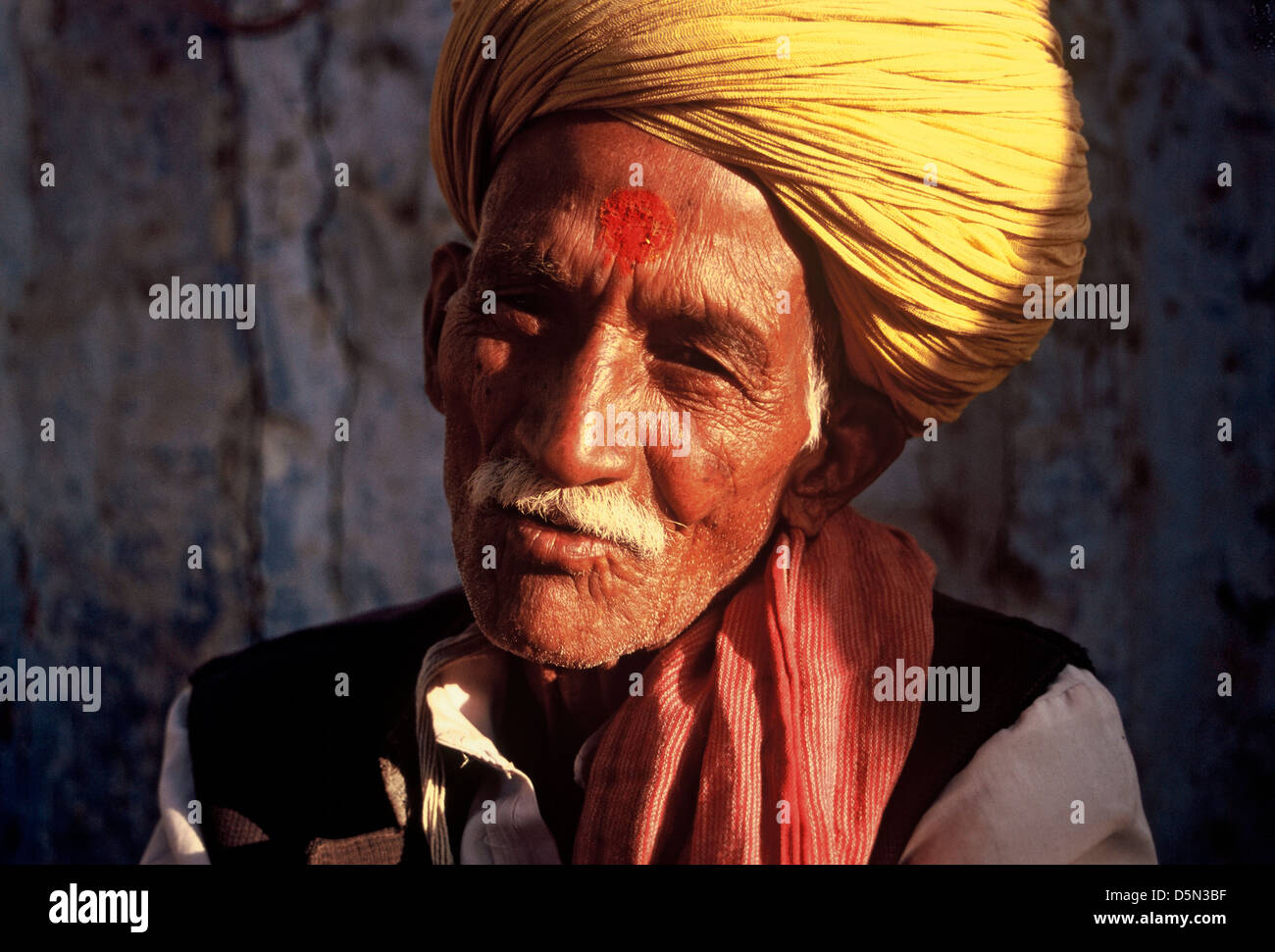 An Indian man traditionally dressed is smiling Stock Photo - Alamy