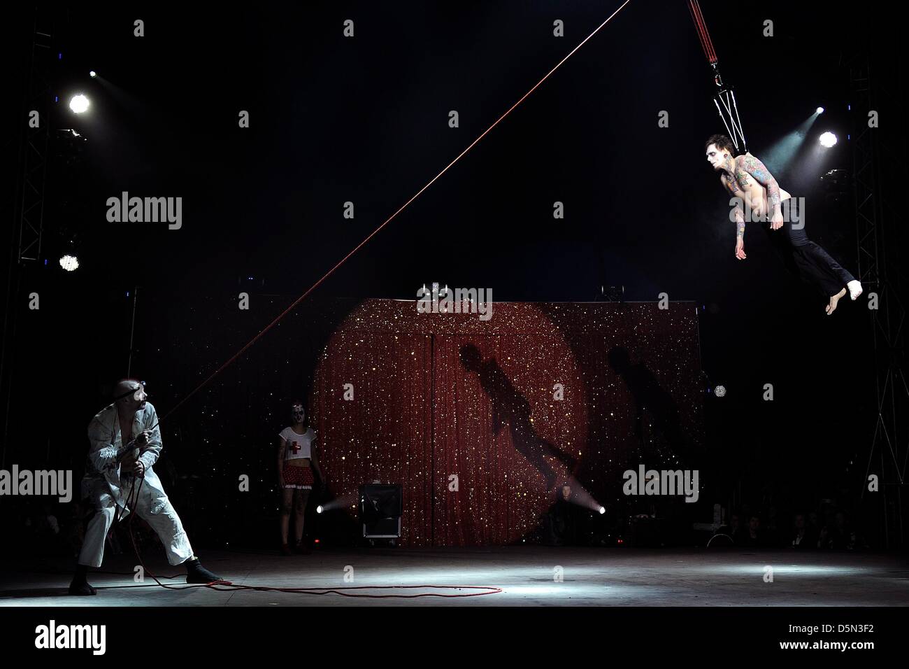Essen, Germany, 04 April 2013. A circus artist is pulled into the air ...