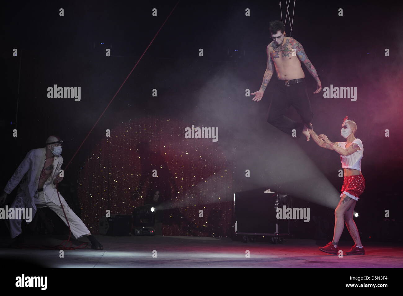 Essen, Germany, 04 April 2013. A circus artist is pulled into the air ...