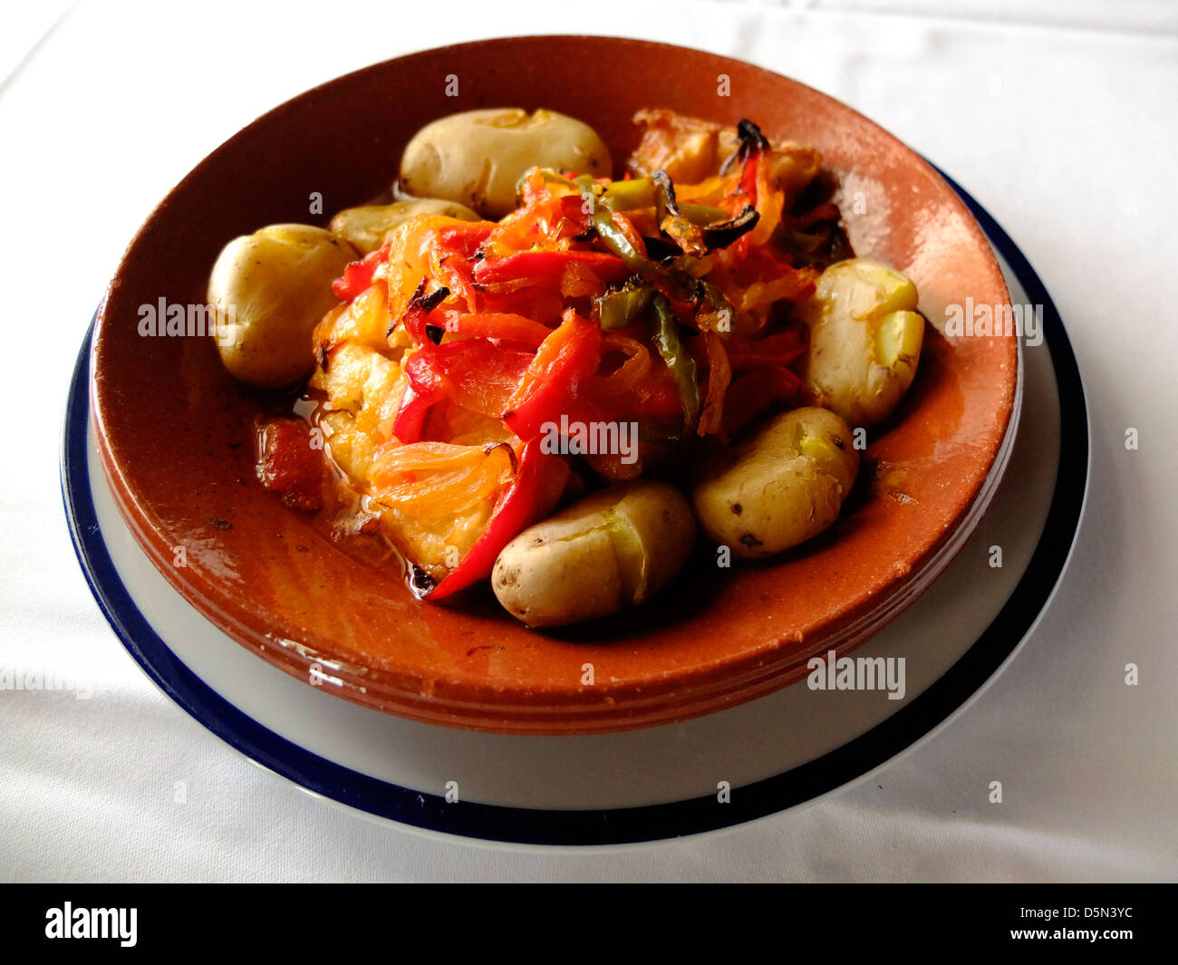 Portuguese fish stew in earthenware dish Stock Photo - Alamy