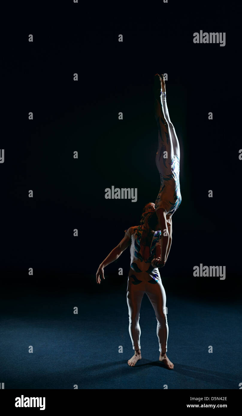 Circus artists perform different tricks Stock Photo - Alamy
