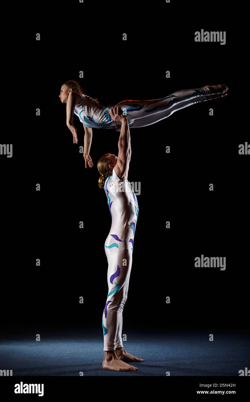 Circus artists perform different tricks Stock Photo - Alamy