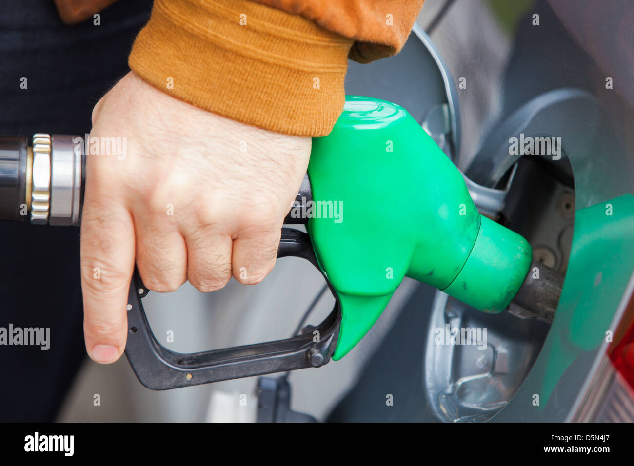 Petrol pump filling Stock Photo - Alamy