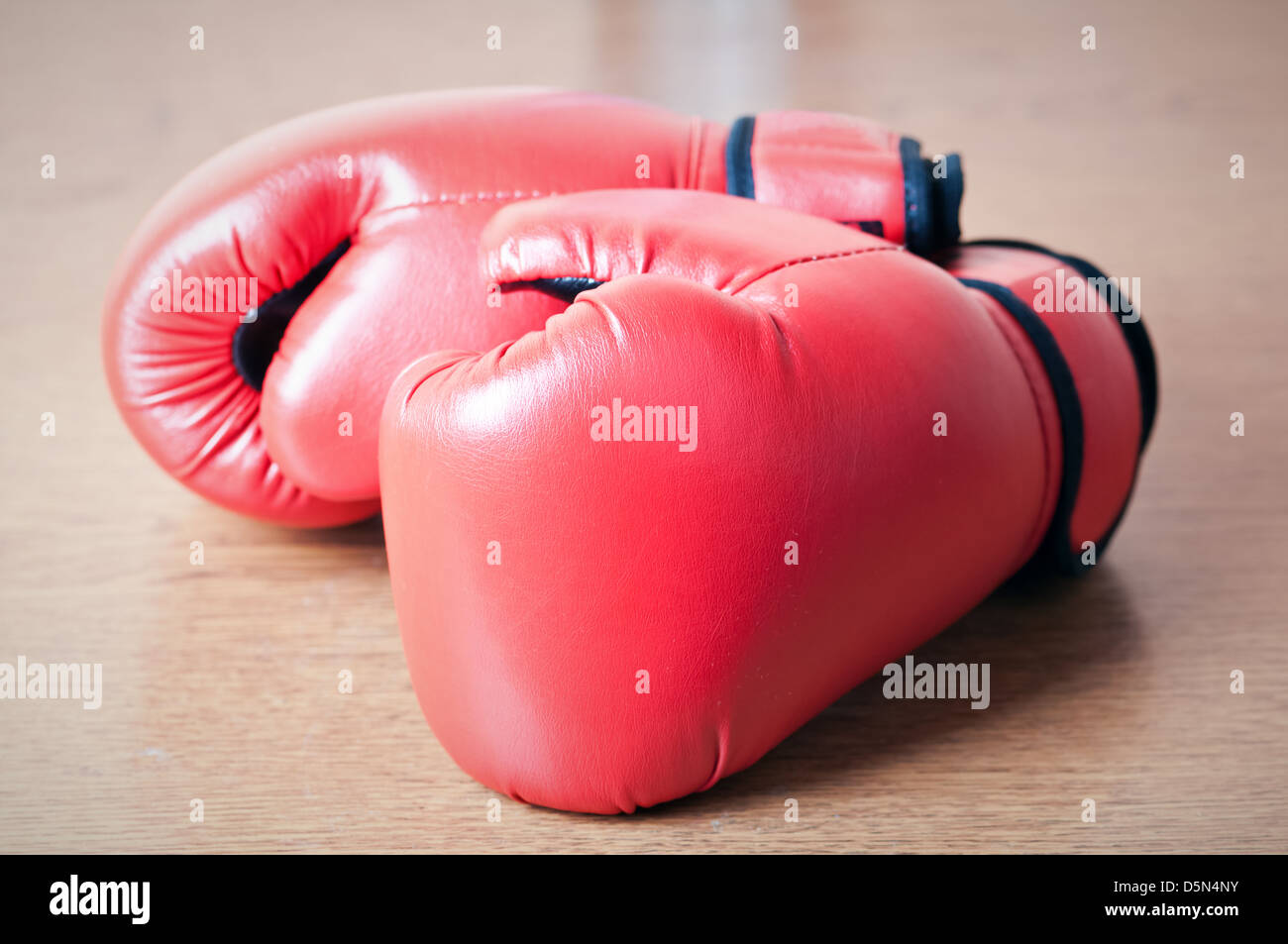 Boxing gloves on table hi-res stock photography and images - Alamy