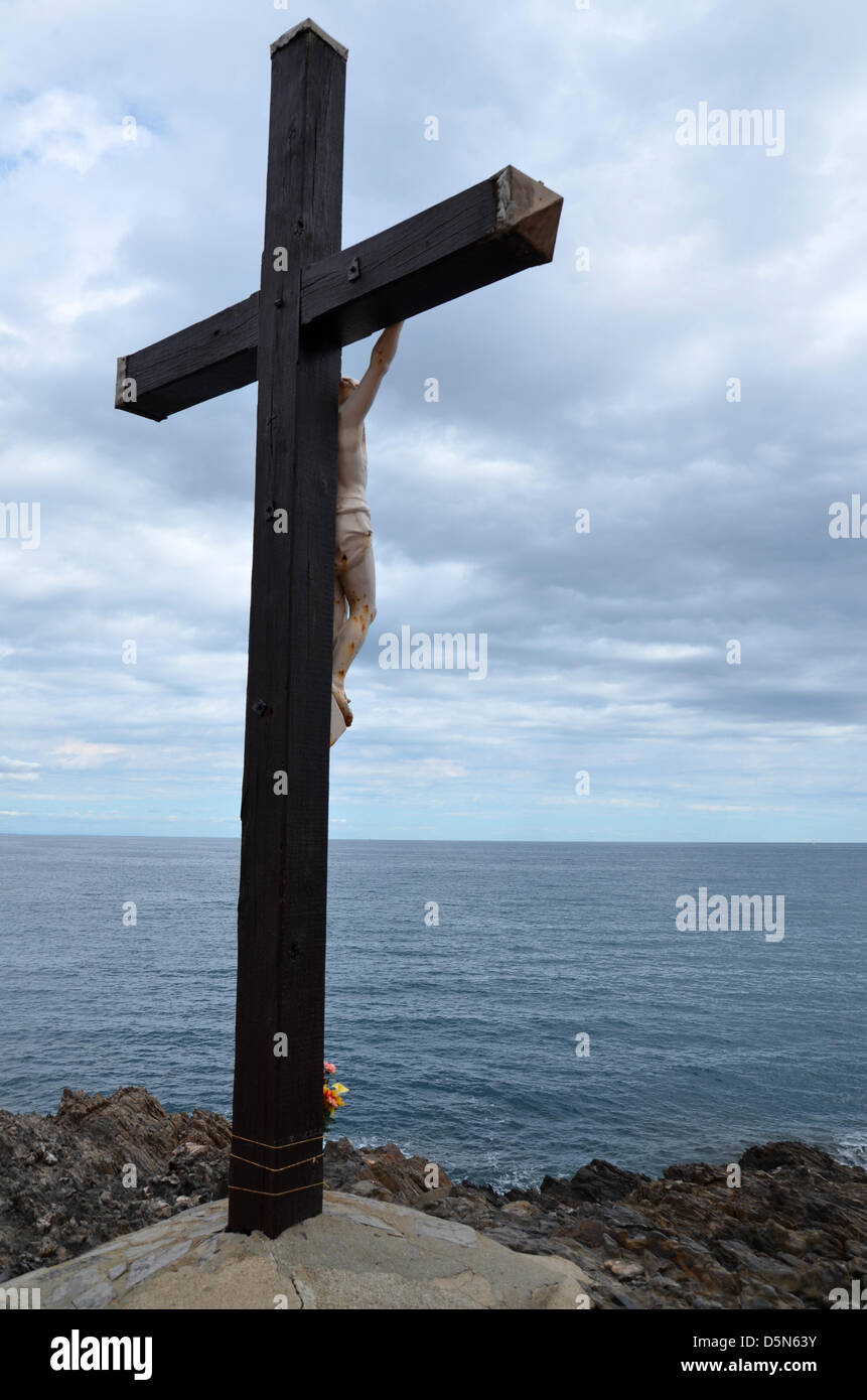 A crucifix stands at the shore of Collioure at the french mediterranean ...