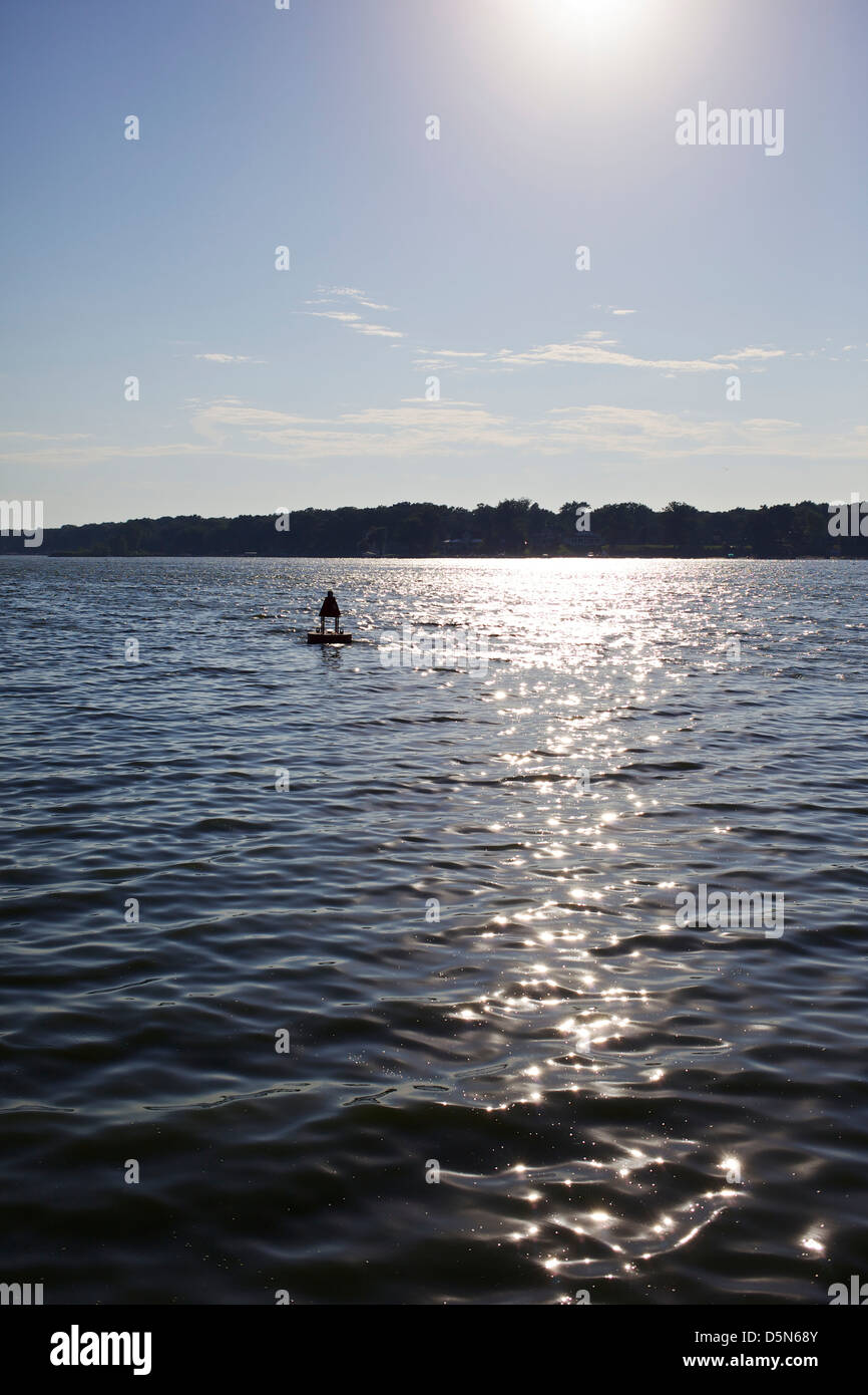 sunset approaching over Lake Macatawa at Kollen park in Holland ...