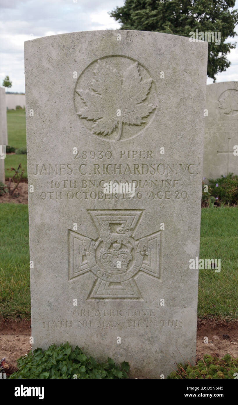 The grave of Piper James C. Richards VC in the CWGC Adanac Military Cemetery, Miraumont, Somme ...