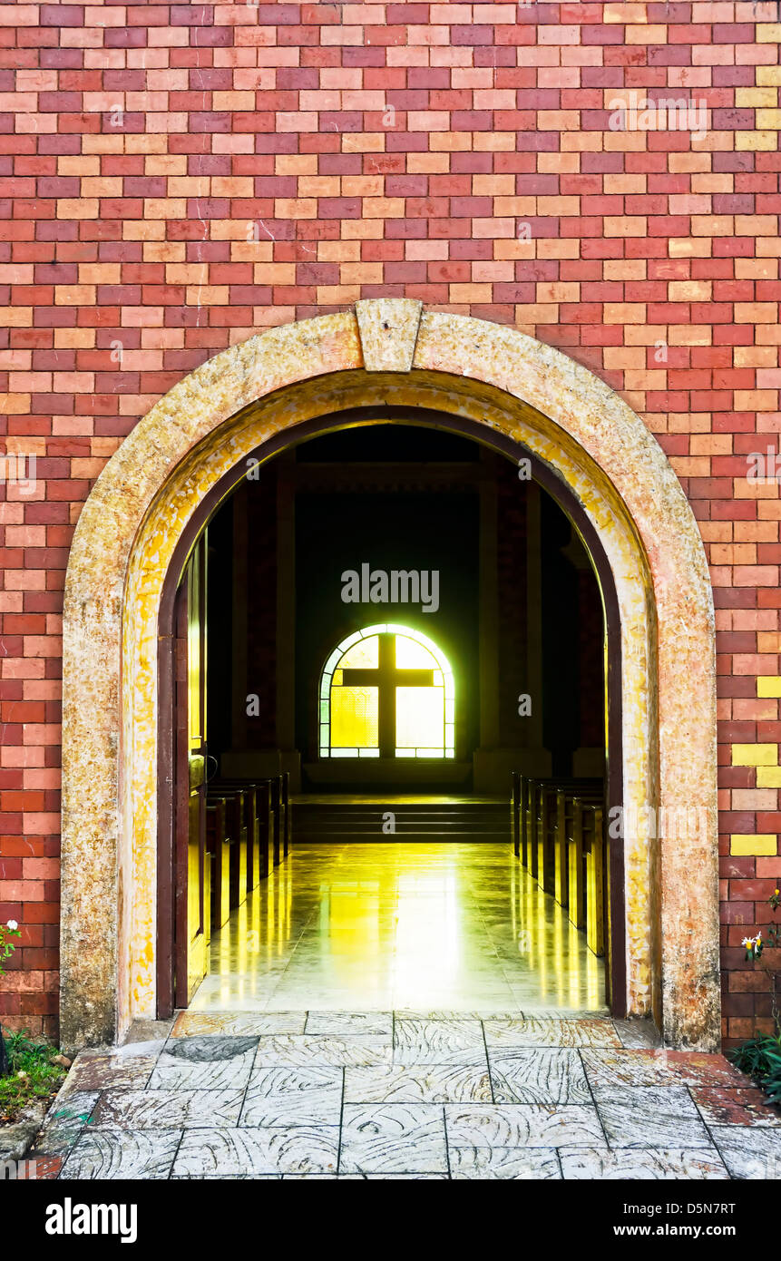 Heavy arch entrance of an ecumenical church Stock Photo - Alamy