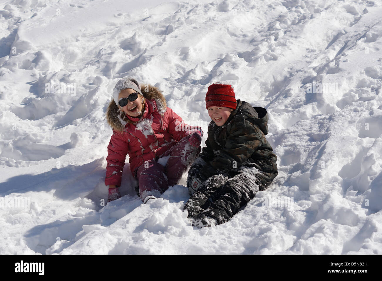 children playing in snow Stock Photo - Alamy