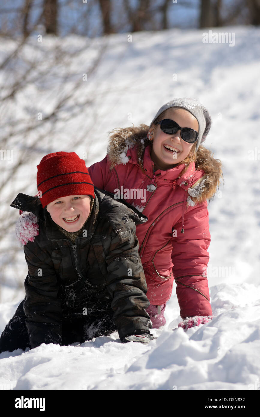 children playing in snow Stock Photo - Alamy
