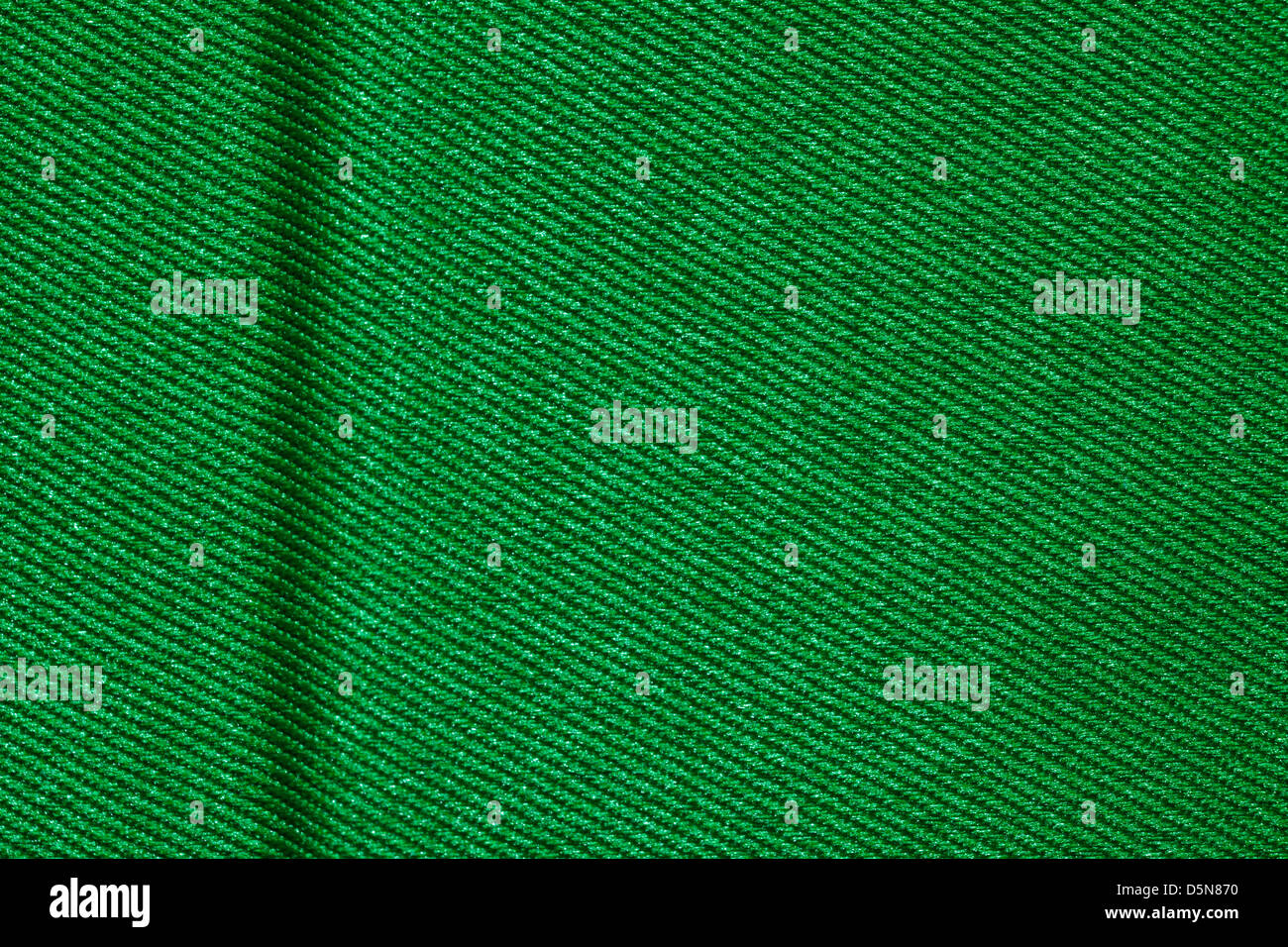 green canvas background with margin on left side or woven textile ...