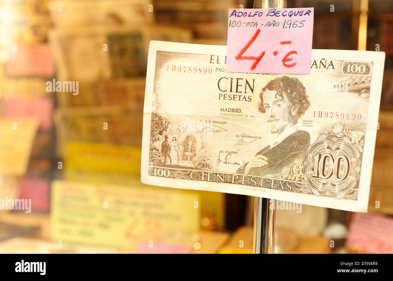 Spanish peseta banknote on a window shop for collection Stock Photo - Alamy