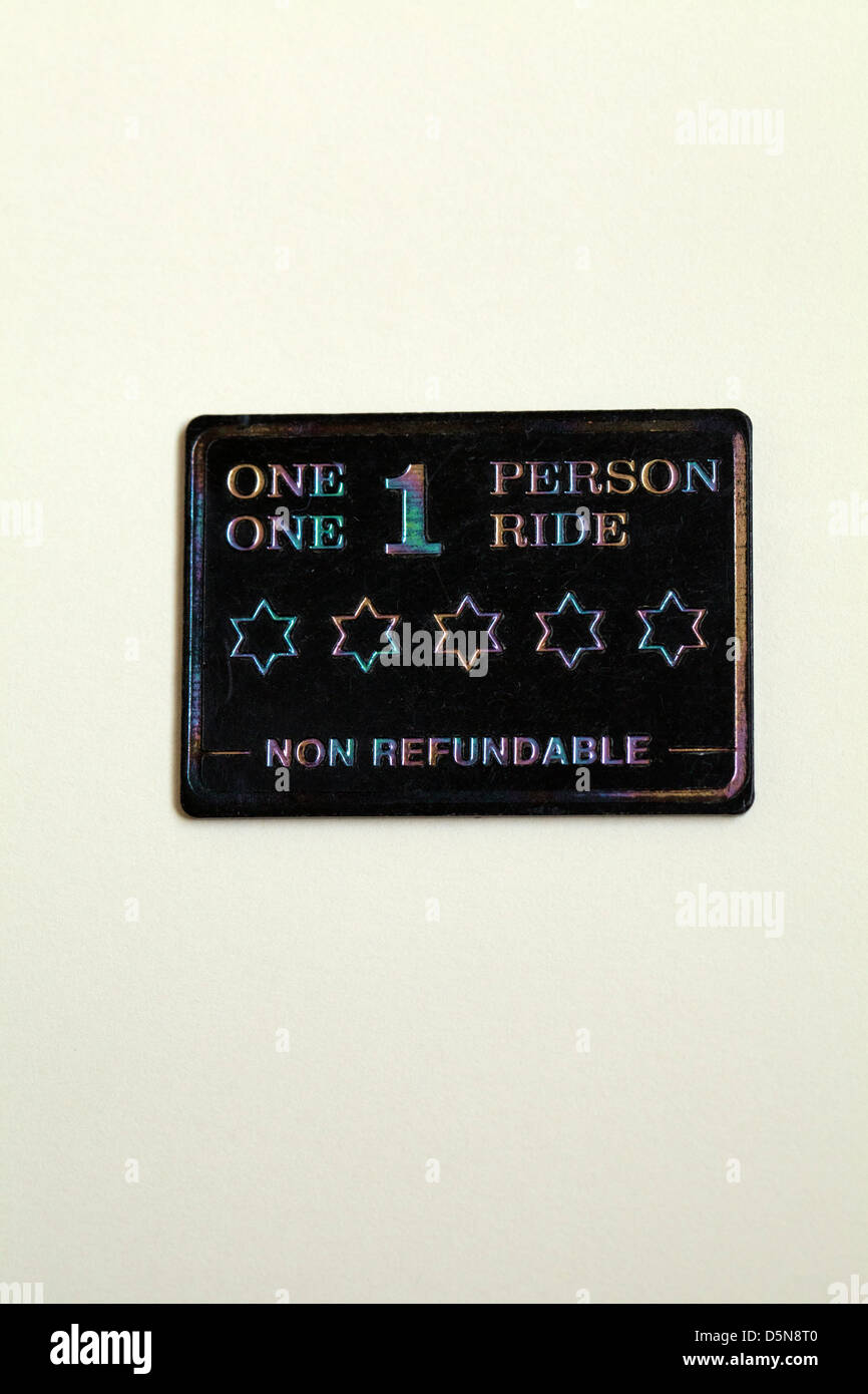 One Person Ride Fairground Tokens Stock Photo - Alamy