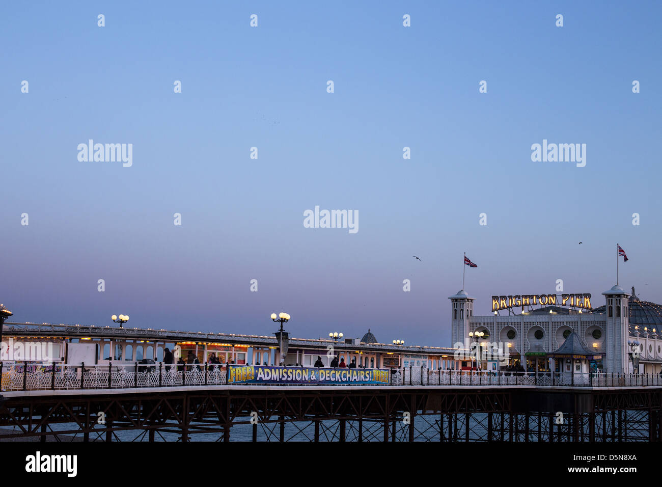 Brighton pier at sunset Stock Photo - Alamy