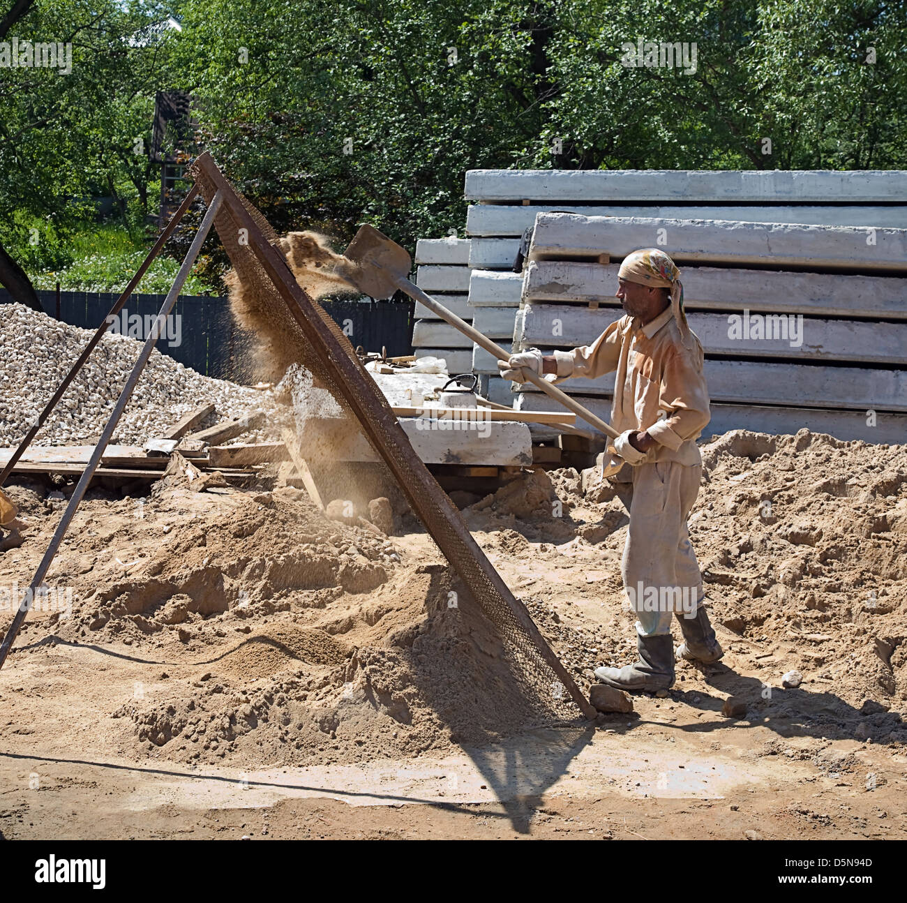 The builder on a building site Stock Photo - Alamy