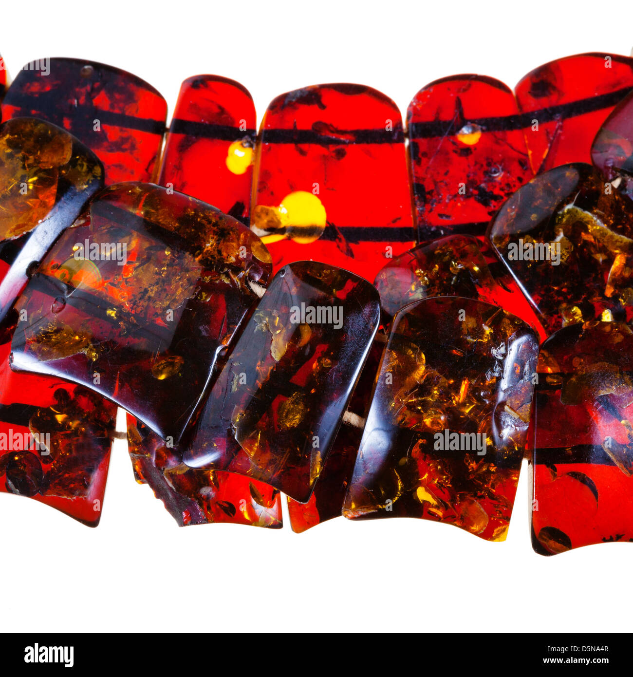 strings of amber necklace isolated on white background Stock Photo - Alamy